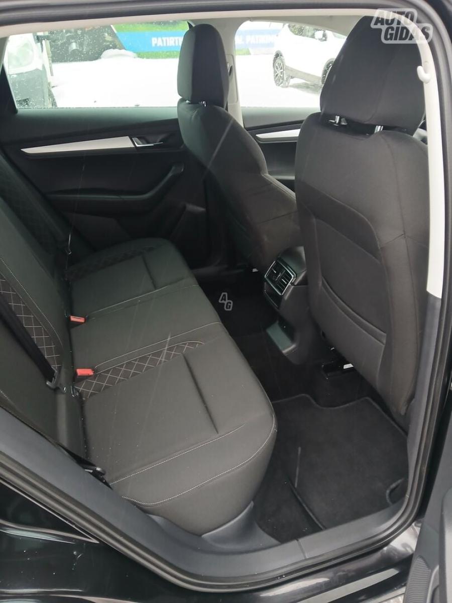 Black Skoda Karoq 2018 in Taurage, with an engine capacity of 2.00 L and mileage of 265 thousand km for 11950 €, photo 17 on AUTOMOTO.COM.LV