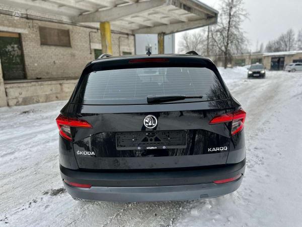 Black Skoda Karoq 2018 in Siauliai, with an engine capacity of 1.60 L and mileage of 182 thousand km for 11900 €, photo 9 on AUTOMOTO.COM.LV