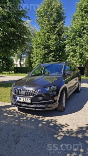 Black Skoda Karoq 2018 in Riga, with an engine capacity of 1.60 L and mileage of 159 thousand km for 15600 €, photo  on AUTOMOTO.COM.LV