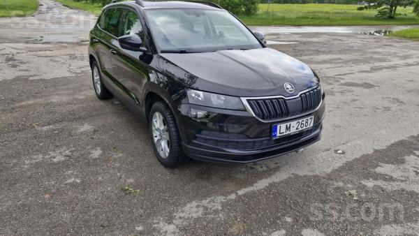 Black Skoda Karoq 2018 in Riga, with an engine capacity of 1.60 L and mileage of 159 thousand km for 15600 €, photo 4 on AUTOMOTO.COM.LV