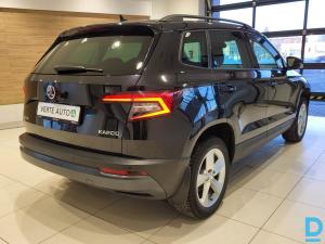 Black Skoda Karoq 2019 in Riga, with an engine capacity of 1.60 L and mileage of 113 thousand km for 17990 €, photo 4 on AUTOMOTO.COM.LV
