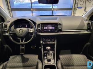 Black Skoda Karoq 2019 in Riga, with an engine capacity of 1.60 L and mileage of 113 thousand km for 17990 €, photo 5 on AUTOMOTO.COM.LV