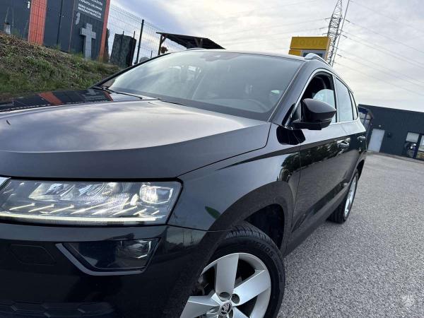 Black Skoda Karoq 2019 in Kaunas, with an engine capacity of 0.00 L and mileage of 260 thousand km for 11790 €, photo 4 on AUTOMOTO.COM.LV