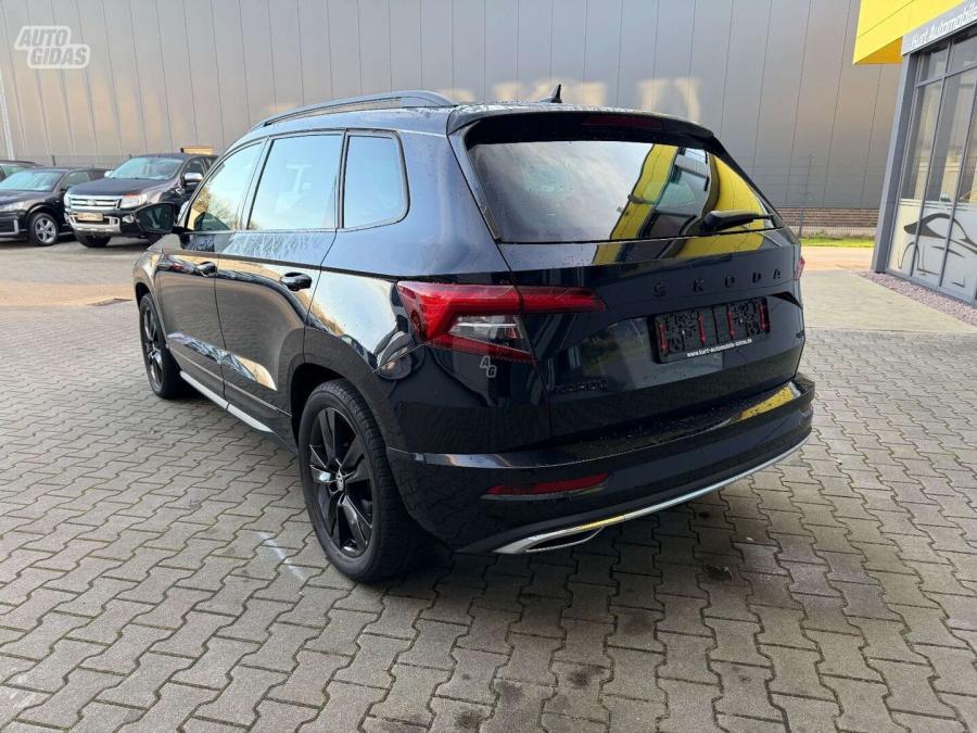 Black Skoda Karoq 2020 in Kaunas, with an engine capacity of 2.00 L and mileage of 49 thousand km for 32690 €, photo 4 on AUTOMOTO.COM.LV