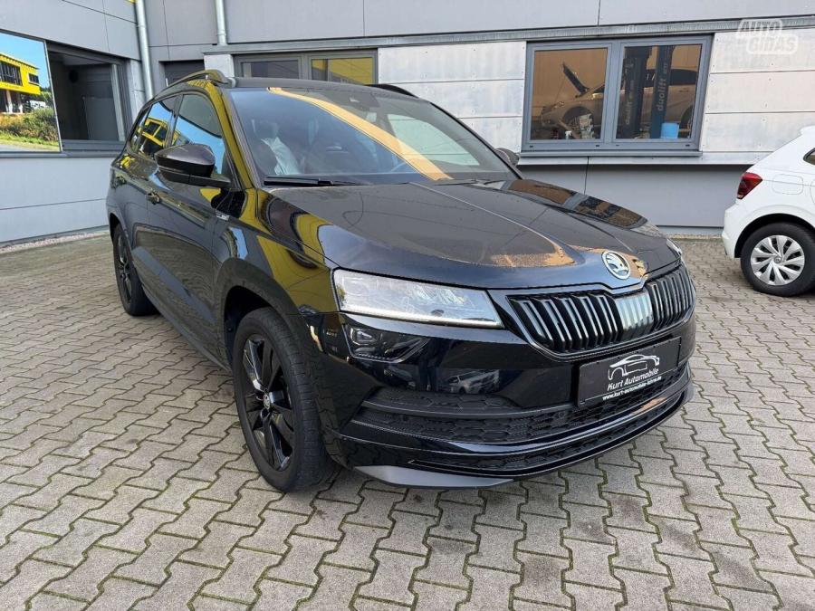 Black Skoda Karoq 2020 in Kaunas, with an engine capacity of 2.00 L and mileage of 49 thousand km for 32690 €, photo 8 on AUTOMOTO.COM.LV