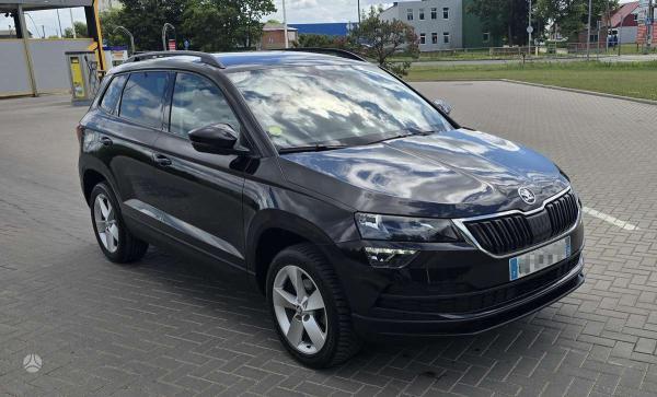 Black Skoda Karoq 2021 in Taurage, with an engine capacity of 1.97 L and mileage of 236 thousand km for 13700 €, photo 1 on AUTOMOTO.COM.LV