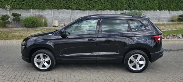 Black Skoda Karoq 2021 in Taurage, with an engine capacity of 1.97 L and mileage of 236 thousand km for 13700 €, photo 7 on AUTOMOTO.COM.LV