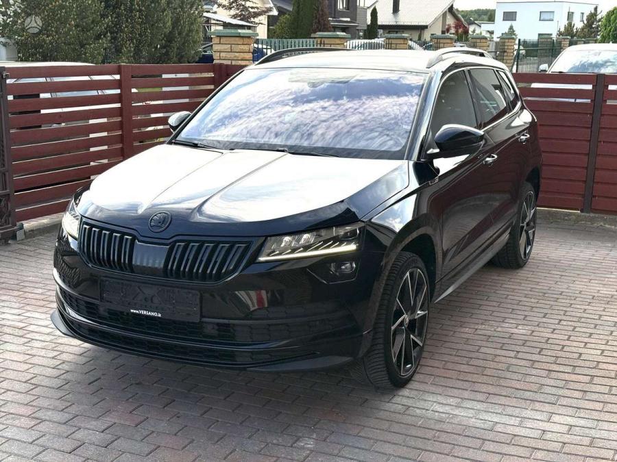 Black Skoda Karoq 2021 in Siauliai, with an engine capacity of 1.50 L and mileage of 215 thousand km for 18390 €, photo 1 on AUTOMOTO.COM.LV