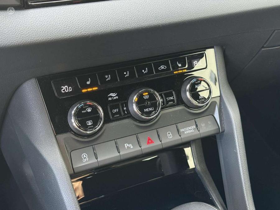 Black Skoda Karoq 2021 in Siauliai, with an engine capacity of 1.50 L and mileage of 215 thousand km for 18390 €, photo 21 on AUTOMOTO.COM.LV
