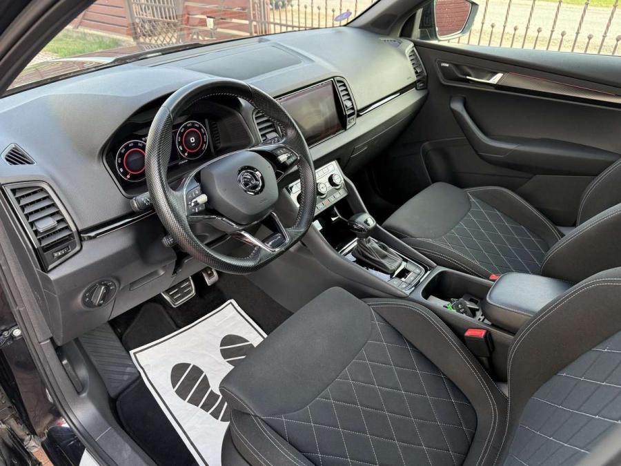 Black Skoda Karoq 2021 in Siauliai, with an engine capacity of 1.50 L and mileage of 215 thousand km for 18390 €, photo 13 on AUTOMOTO.COM.LV