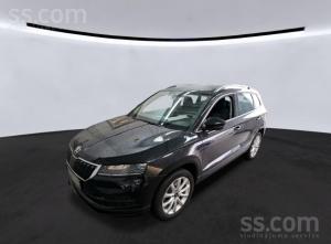 Black Skoda Karoq 2021 in Valmiera, with an engine capacity of 2.00 L and mileage of 90 thousand km for 19500 €, photo 3 on AUTOMOTO.COM.LV