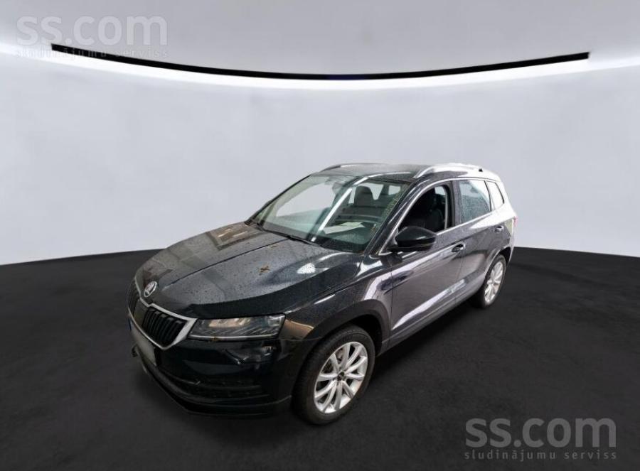 Black Skoda Karoq 2021 in Valmiera, with an engine capacity of 2.00 L and mileage of 90 thousand km for 19500 €, photo 3 on AUTOMOTO.COM.LV