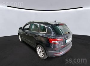 Black Skoda Karoq 2021 in Valmiera, with an engine capacity of 2.00 L and mileage of 90 thousand km for 19500 €, photo 5 on AUTOMOTO.COM.LV