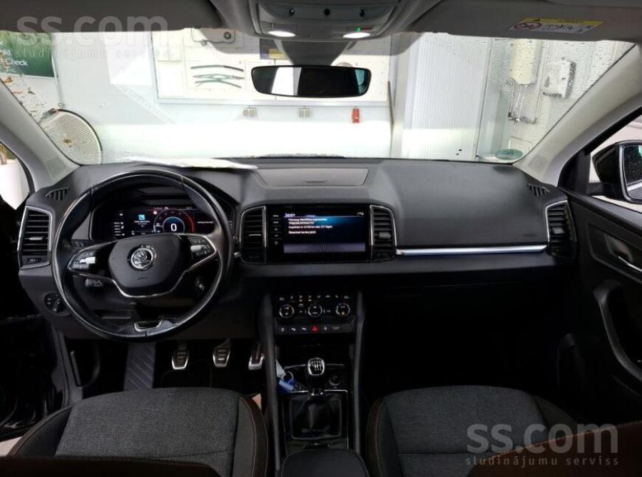 Black Skoda Karoq 2021 in Valmiera, with an engine capacity of 2.00 L and mileage of 90 thousand km for 19500 €, photo 6 on AUTOMOTO.COM.LV