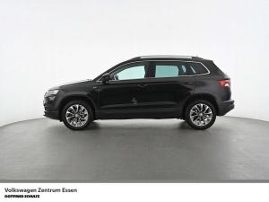 Black Skoda Karoq 2022 in Kaunas, with an engine capacity of 1.00 L and mileage of 34 thousand km for 25449 €, photo 3 on AUTOMOTO.COM.LV