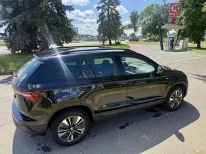 Black Skoda Karoq 2022 in Taurage, with an engine capacity of 1.97 L and mileage of 200 thousand km for 17900 €, photo 10 on AUTOMOTO.COM.LV