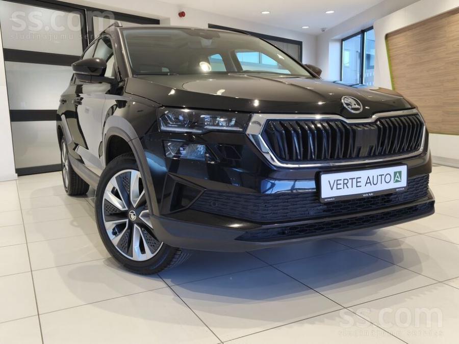 Black Skoda Karoq 2022 in Riga, with an engine capacity of 2.00 L and mileage of 147 thousand km for 19490 €, photo 1 on AUTOMOTO.COM.LV