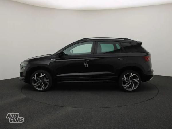 Black Skoda Karoq 2023 in Vilnius, with an engine capacity of 1.50 L and mileage of 203 thousand km for 21699 €, photo 6 on AUTOMOTO.COM.LV
