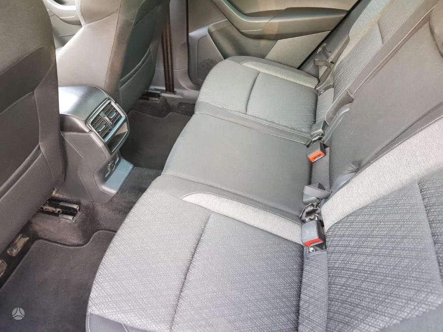 Black Skoda Karoq 2023 in Siauliai, with an engine capacity of 1.97 L and mileage of 178 thousand km for 17700 €, photo 11 on AUTOMOTO.COM.LV
