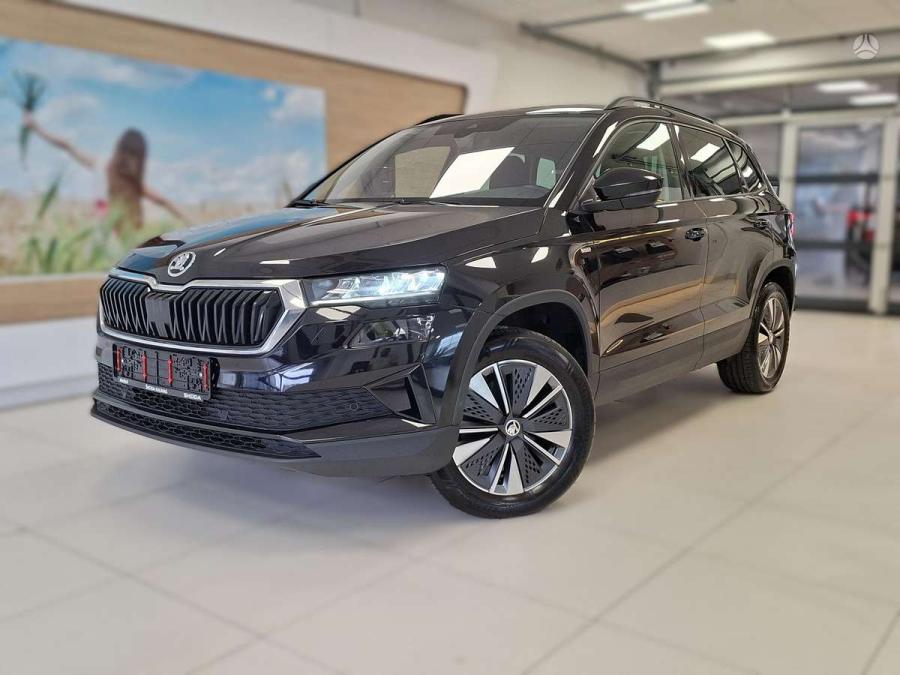 Black Skoda Karoq 2023 in Kaunas, with an engine capacity of 1.97 L and mileage of 174 thousand km for 19800 €, photo 1 on AUTOMOTO.COM.LV