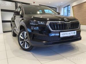 Black Skoda Karoq 2023 in Riga, with an engine capacity of 2.00 L and mileage of 147 thousand km for 19490 €, photo 1 on AUTOMOTO.COM.LV