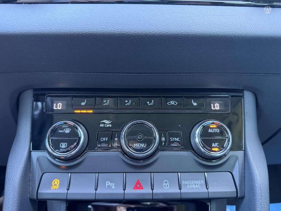 Black Skoda Karoq 2023 in Kaunas, with an engine capacity of 1.50 L and mileage of 165 thousand km for 19900 €, photo 26 on AUTOMOTO.COM.LV