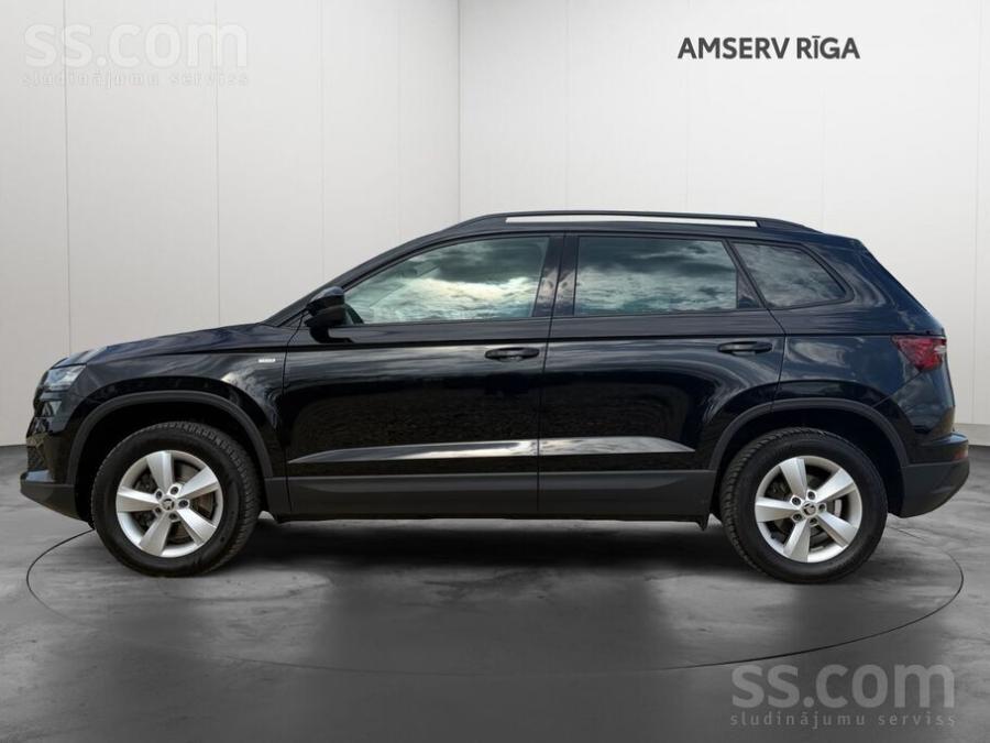 Black Skoda Karoq 2023 in Riga, with an engine capacity of 2.00 L and mileage of 100 thousand km for 22000 €, photo 4 on AUTOMOTO.COM.LV