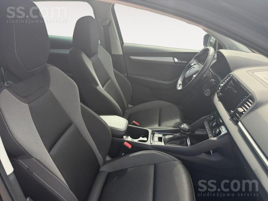 Black Skoda Karoq 2023 in Riga, with an engine capacity of 2.00 L and mileage of 100 thousand km for 22000 €, photo 7 on AUTOMOTO.COM.LV