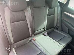 Black Skoda Karoq 2023 in Riga, with an engine capacity of 2.00 L and mileage of 100 thousand km for 22000 €, photo 8 on AUTOMOTO.COM.LV