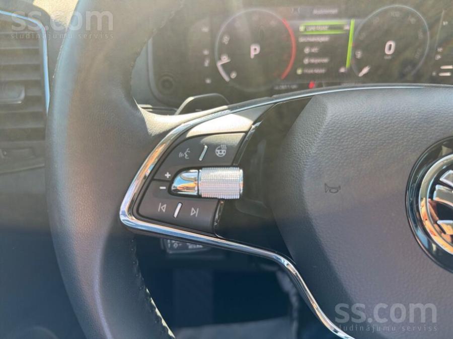 Black Skoda Karoq 2023 in Riga, with an engine capacity of 2.00 L and mileage of 100 thousand km for 22000 €, photo 11 on AUTOMOTO.COM.LV