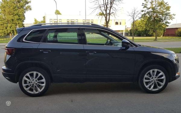 Black Skoda Karoq 2023 in Siauliai, with an engine capacity of 1.97 L and mileage of 178 thousand km for 17200 €, photo 5 on AUTOMOTO.COM.LV