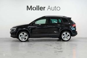 Black Skoda Karoq 2023 in Vilnius, with an engine capacity of 2.00 L and mileage of 140 thousand km for 24400 €, photo 3 on AUTOMOTO.COM.LV