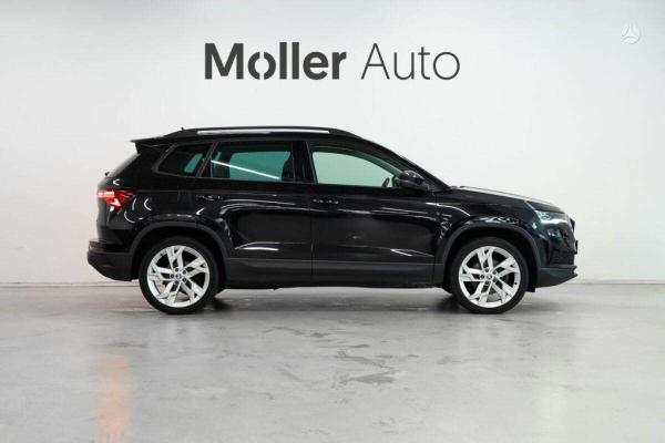 Black Skoda Karoq 2023 in Vilnius, with an engine capacity of 2.00 L and mileage of 140 thousand km for 24400 €, photo 4 on AUTOMOTO.COM.LV