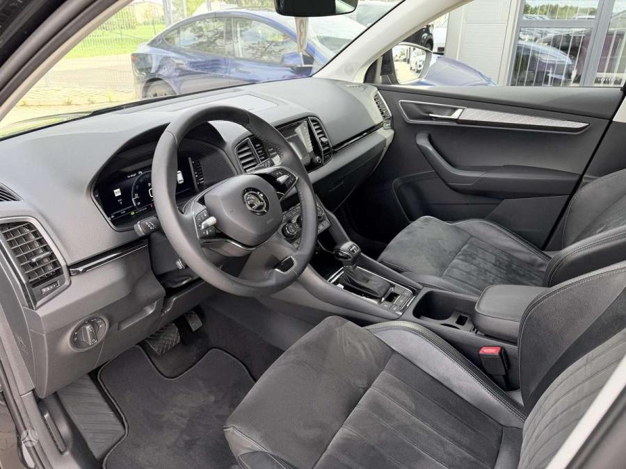 Black Skoda Karoq 2023 in Siauliai, with an engine capacity of 1.50 L and mileage of 165 thousand km for 21490 €, photo 13 on AUTOMOTO.COM.LV