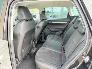 Black Skoda Karoq 2023 in Siauliai, with an engine capacity of 1.50 L and mileage of 165 thousand km for 21490 €, photo 15 on AUTOMOTO.COM.LV