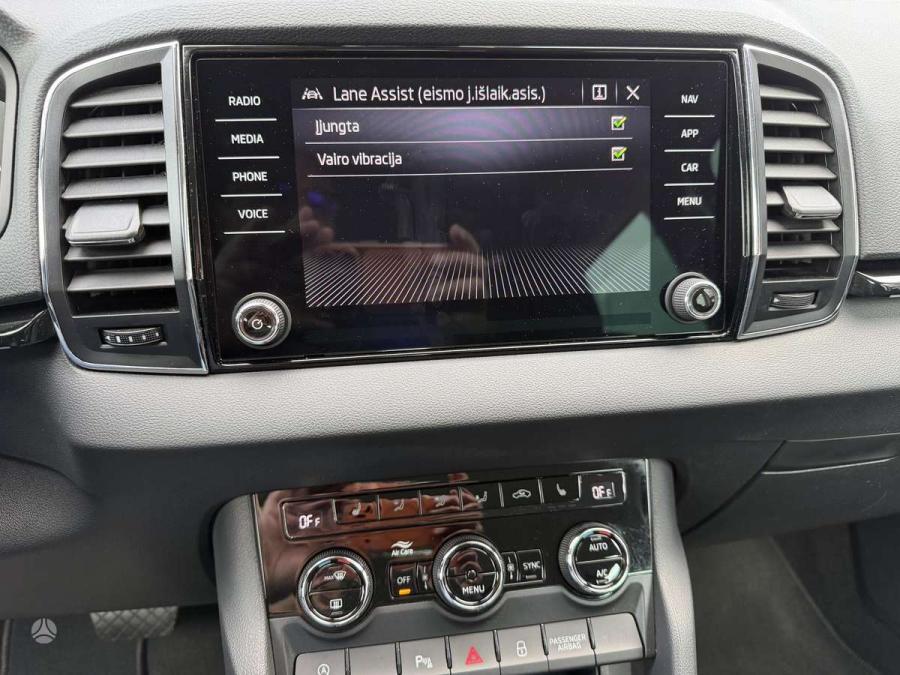 Black Skoda Karoq 2023 in Siauliai, with an engine capacity of 1.50 L and mileage of 165 thousand km for 21490 €, photo 21 on AUTOMOTO.COM.LV