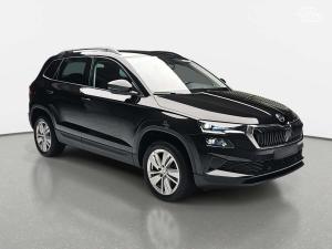 Black Skoda Karoq 2024 in Kaunas, with an engine capacity of 1.50 L and mileage of 32 thousand km for 31660 €, photo 3 on AUTOMOTO.COM.LV