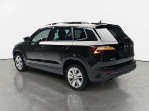 Black Skoda Karoq 2024 in Kaunas, with an engine capacity of 1.50 L and mileage of 32 thousand km for 31660 €, photo 5 on AUTOMOTO.COM.LV