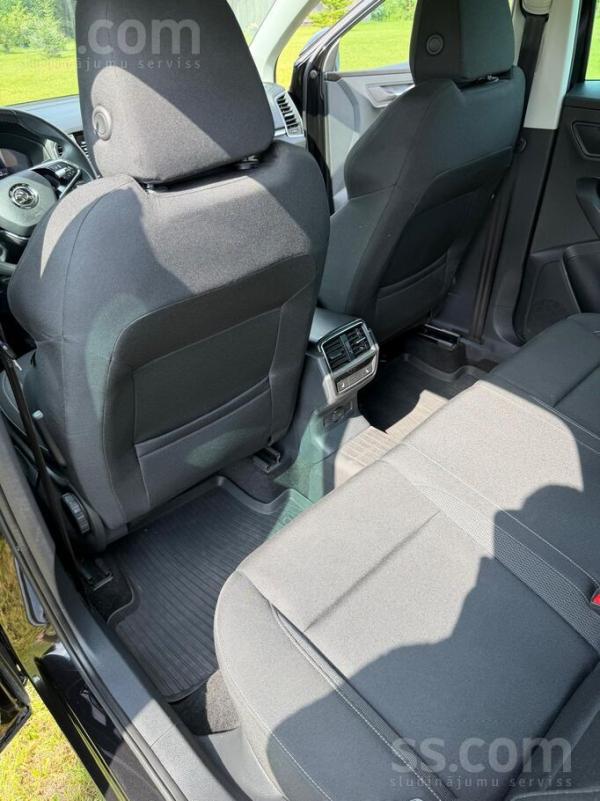 Black Skoda Karoq 2023 in Riga, with an engine capacity of 1.50 L and mileage of 98 thousand km for 21500 €, photo 10 on AUTOMOTO.COM.LV