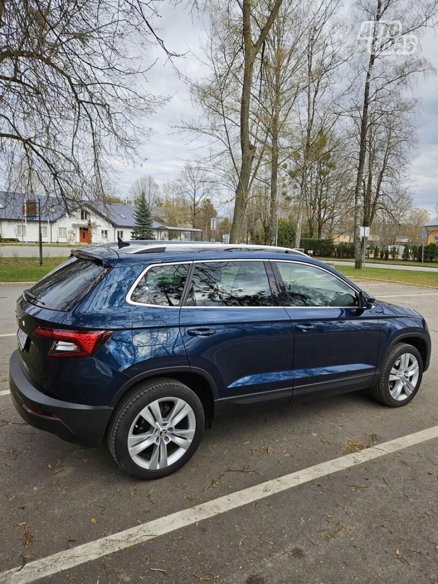 Blue Skoda Karoq 2020 in Kaunas, with an engine capacity of 2.00 L and mileage of 211 thousand km for 19750 €, photo 4 on AUTOMOTO.COM.LV