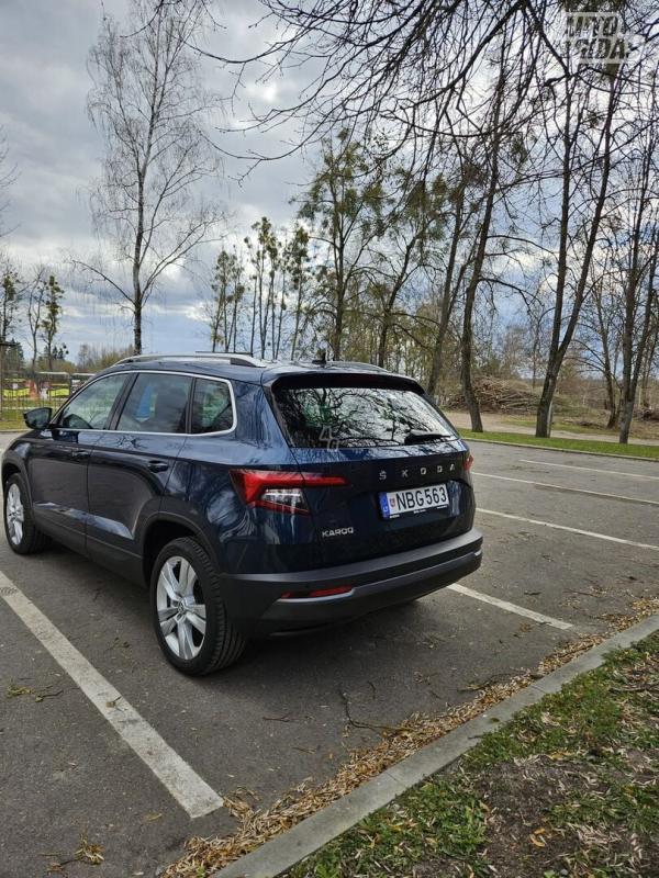 Blue Skoda Karoq 2020 in Kaunas, with an engine capacity of 2.00 L and mileage of 211 thousand km for 19750 €, photo 4 on AUTOMOTO.COM.LV