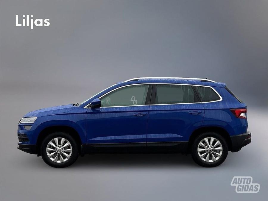 Blue Skoda Karoq 2021 in Kaunas, with an engine capacity of 0.00 L and mileage of 56 thousand km for 25287 €, photo 3 on AUTOMOTO.COM.LV