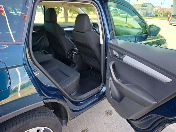 Blue Skoda Karoq 2023 in Taurage, with an engine capacity of 1.97 L and mileage of 212 thousand km for 16999 €, photo 8 on AUTOMOTO.COM.LV