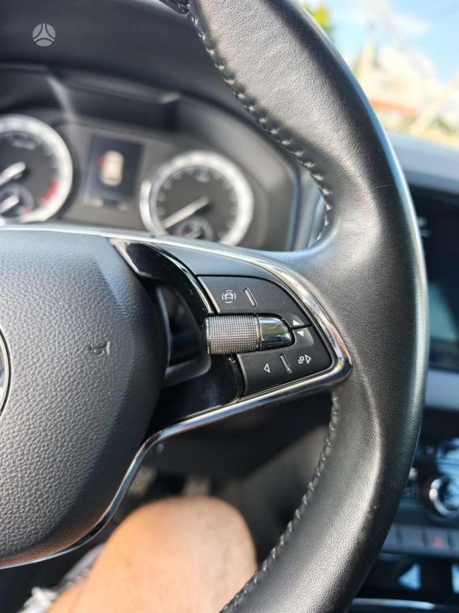 Zils Skoda Karoq 2023 Tauragė, ar dzinēja tilpumu 1.97 L un nobraukumu 200 tūkst. km par 16300 €, foto 24 vietnē AUTOMOTO.COM.LV