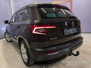 Brown Skoda Karoq 2018 in Jurmala, with an engine capacity of 1.60 L and mileage of 223 thousand km for 12950 €, photo 7 on AUTOMOTO.COM.LV