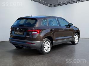 Brown Skoda Karoq 2019 in Riga, with an engine capacity of 1.00 L and mileage of 89 thousand km for 14530 €, photo 6 on AUTOMOTO.COM.LV