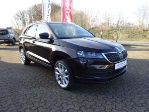 Brown Skoda Karoq 2020 in Kaunas, with an engine capacity of 1.50 L and mileage of 52 thousand km for 22349 €, photo 3 on AUTOMOTO.COM.LV