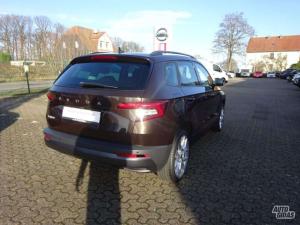 Brown Skoda Karoq 2020 in Kaunas, with an engine capacity of 1.50 L and mileage of 52 thousand km for 22349 €, photo 5 on AUTOMOTO.COM.LV