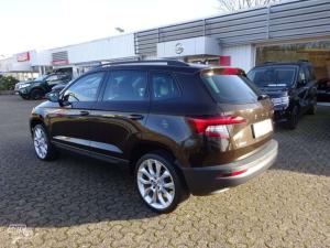 Brown Skoda Karoq 2020 in Kaunas, with an engine capacity of 1.50 L and mileage of 52 thousand km for 22349 €, photo 7 on AUTOMOTO.COM.LV