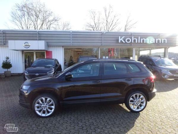 Brown Skoda Karoq 2020 in Kaunas, with an engine capacity of 1.50 L and mileage of 52 thousand km for 22349 €, photo 8 on AUTOMOTO.COM.LV